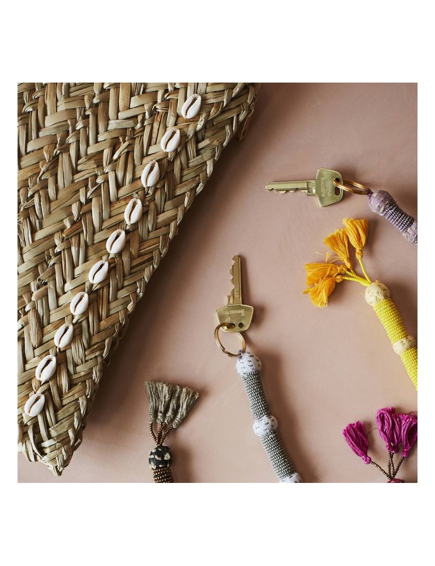 Madam Stoltz straw clutch with sea shells